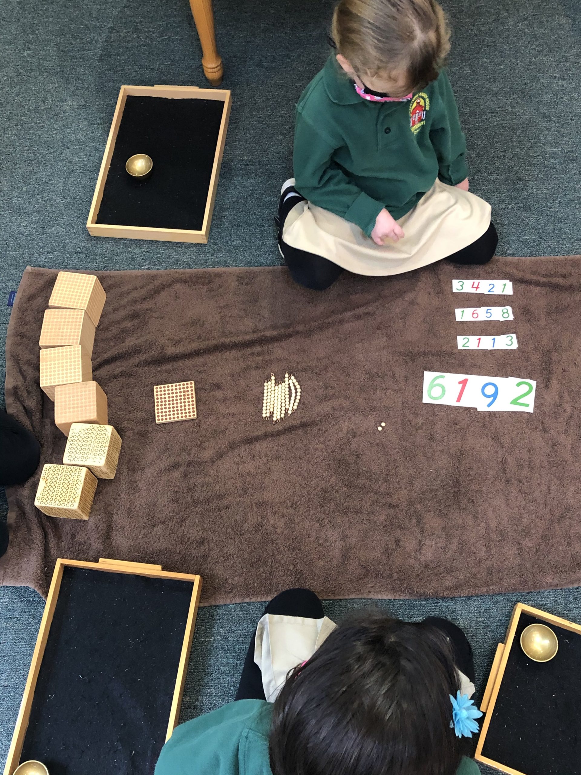 How the Golden Bead Decimal System and Stamp Game Are Used in Math ...